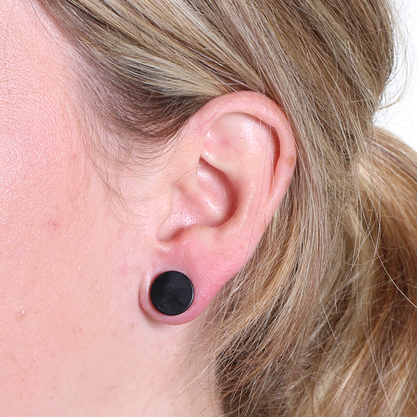Buy a new matte black plug made of surgical steel